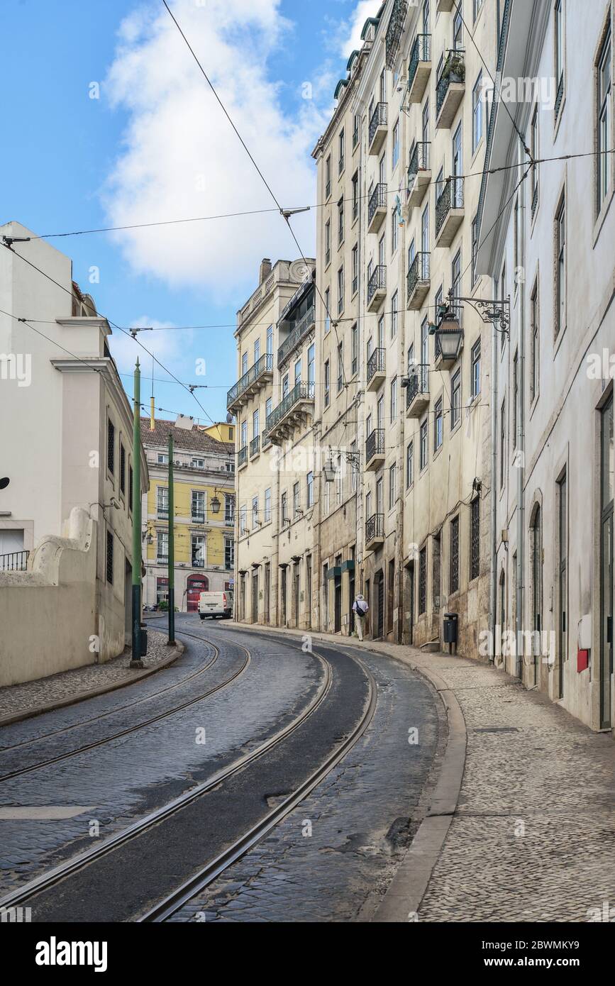 LISBON, PORTUGAL - JULY 4, 2019: Narrow cobblestone streets of the ...