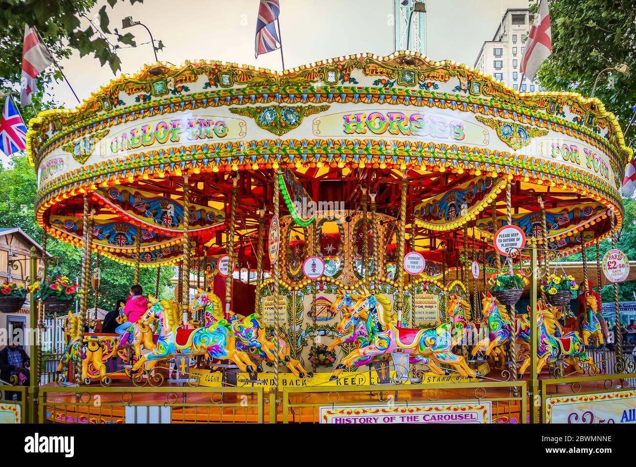 London, UK, Aug 2019, kids on the Golden Carousel located on the ...