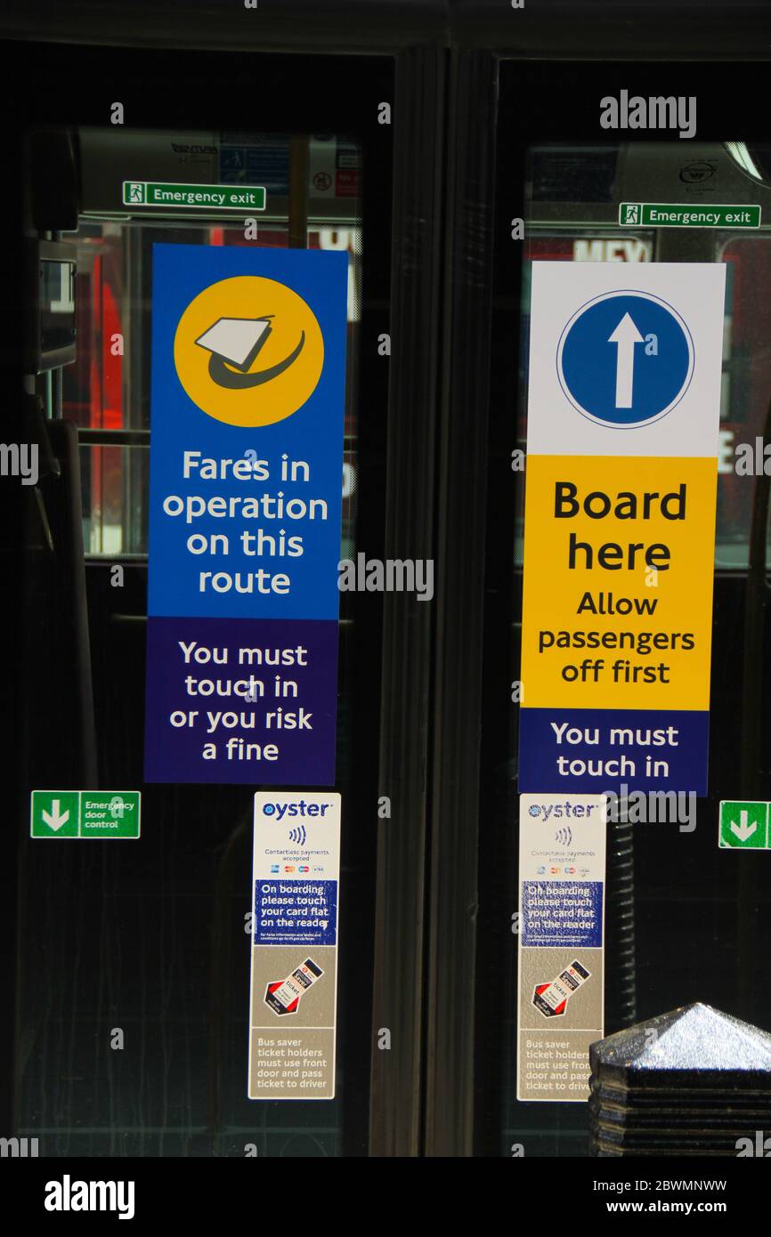 London, UK - 2 June 2020: TFL buses with new signs restricting the ...
