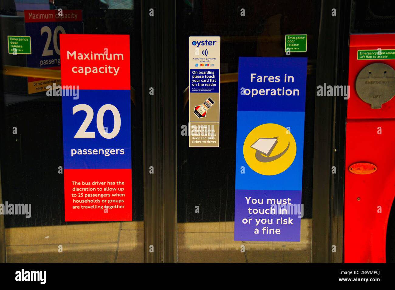 London, UK - 2 June 2020: TFL buses with new signs restricting the ...