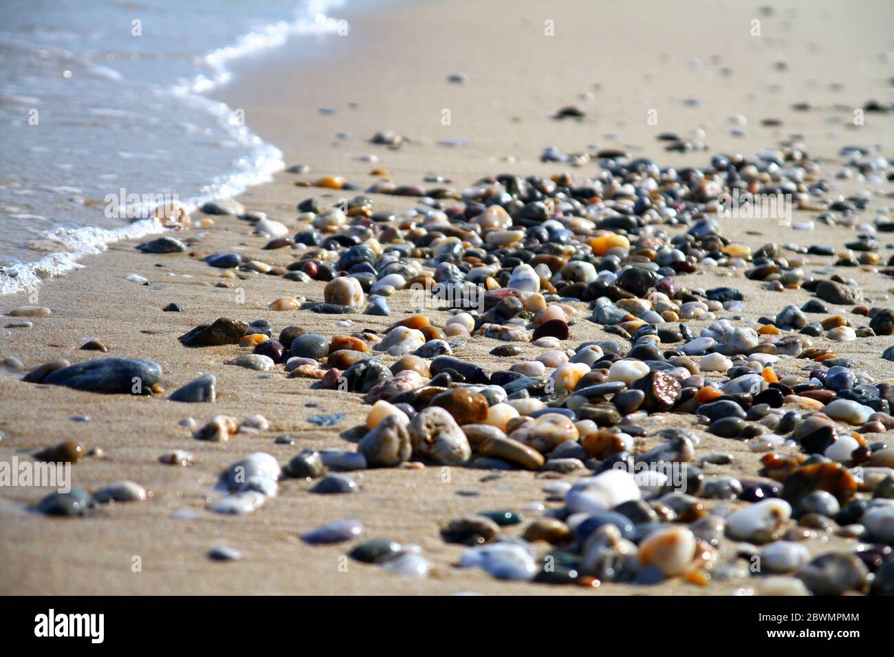 Large smooth rocks on beach hi-res stock photography and images - Alamy