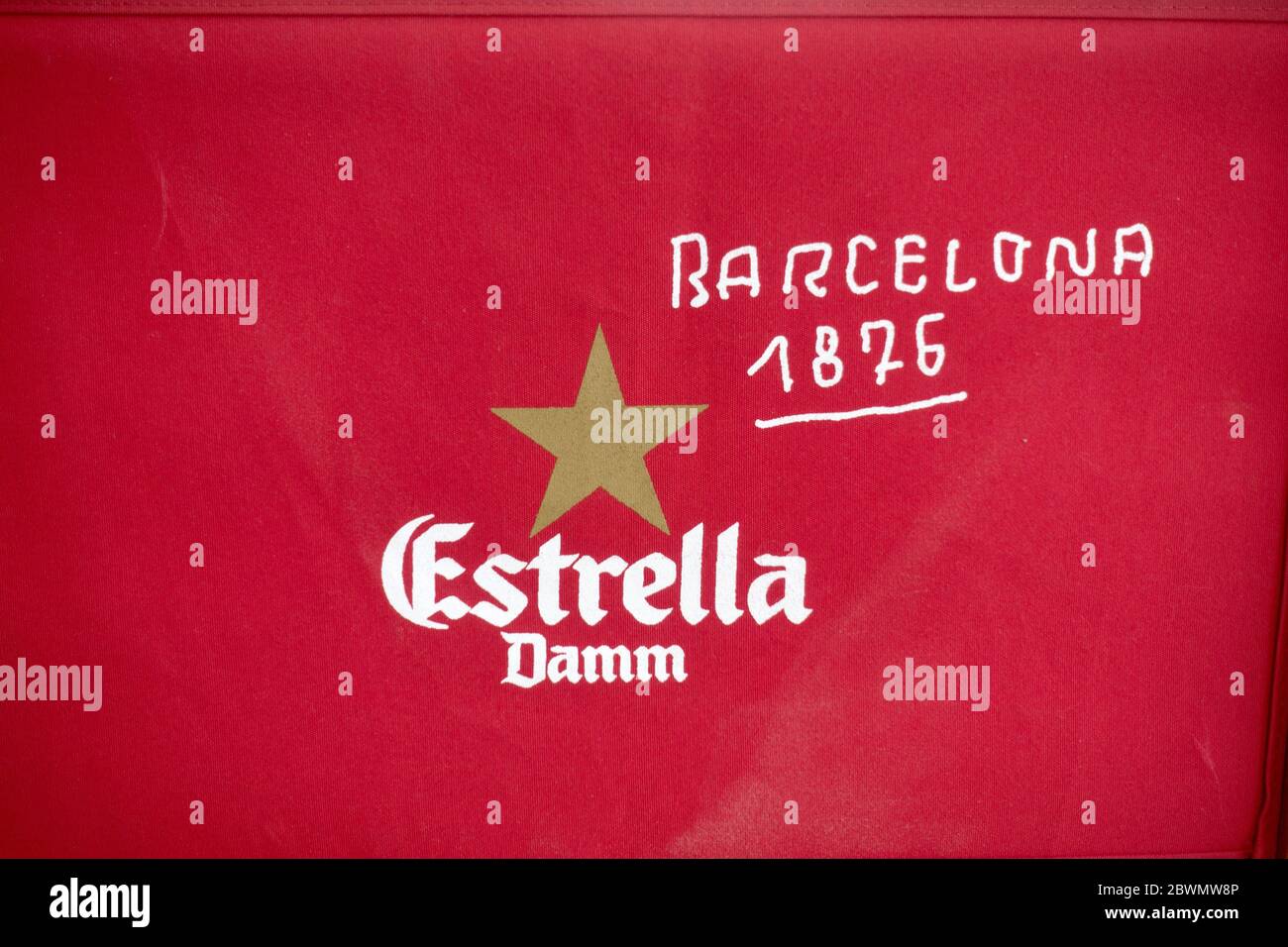 Spanish Estrella Beer Logo Sign Barcelona 1876 On A Fabric Cushion In A ...