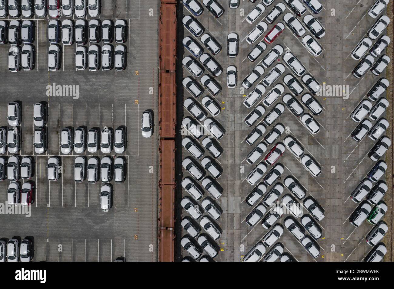 New car lined up aerial view. Port of import and export business ...