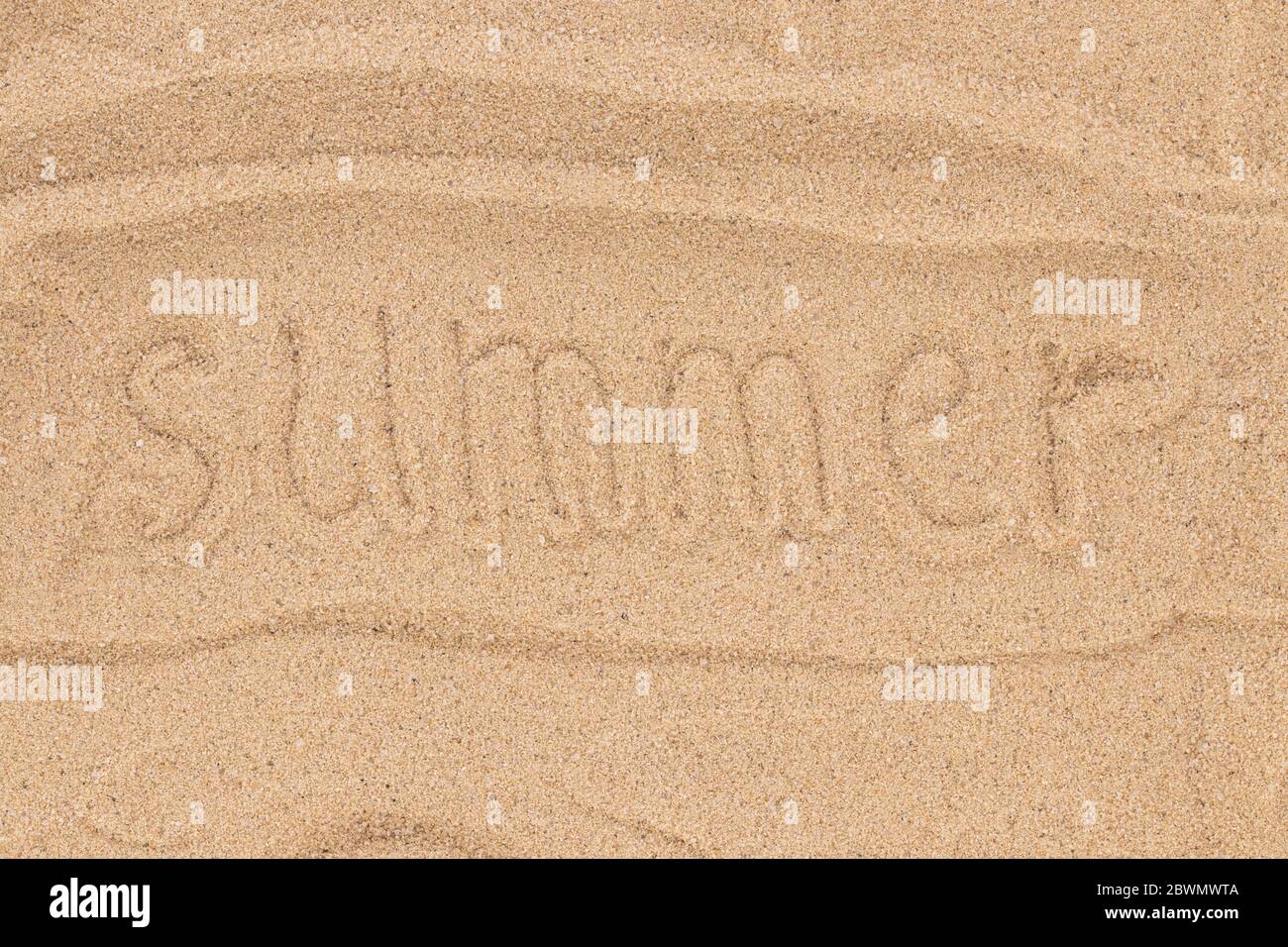 Summer is written in the sand. Sandy beach for background. Summer ...