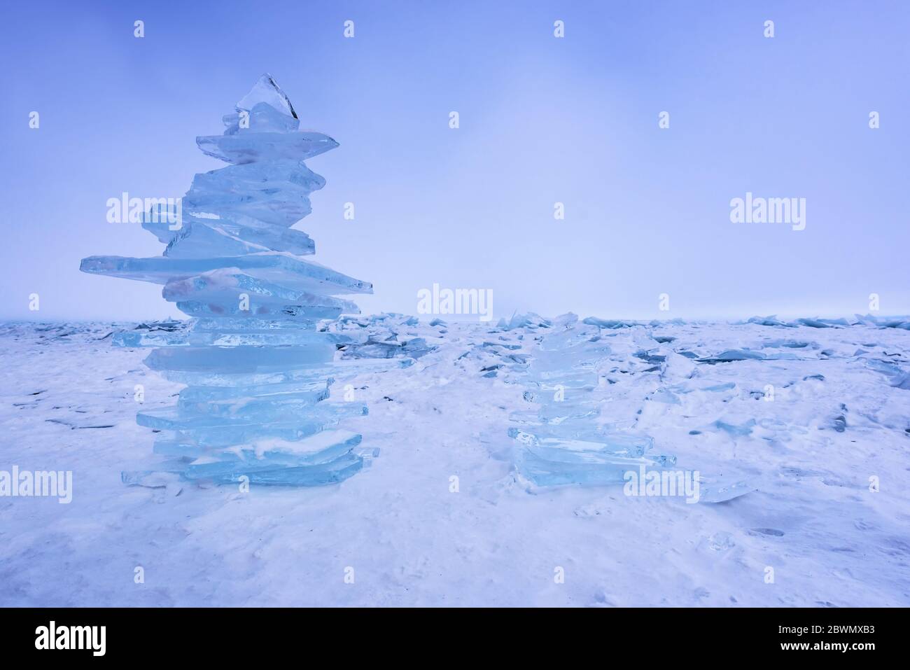 Pyramid of ice blocks. Balance on the icy frozen lake Baikal Stock ...