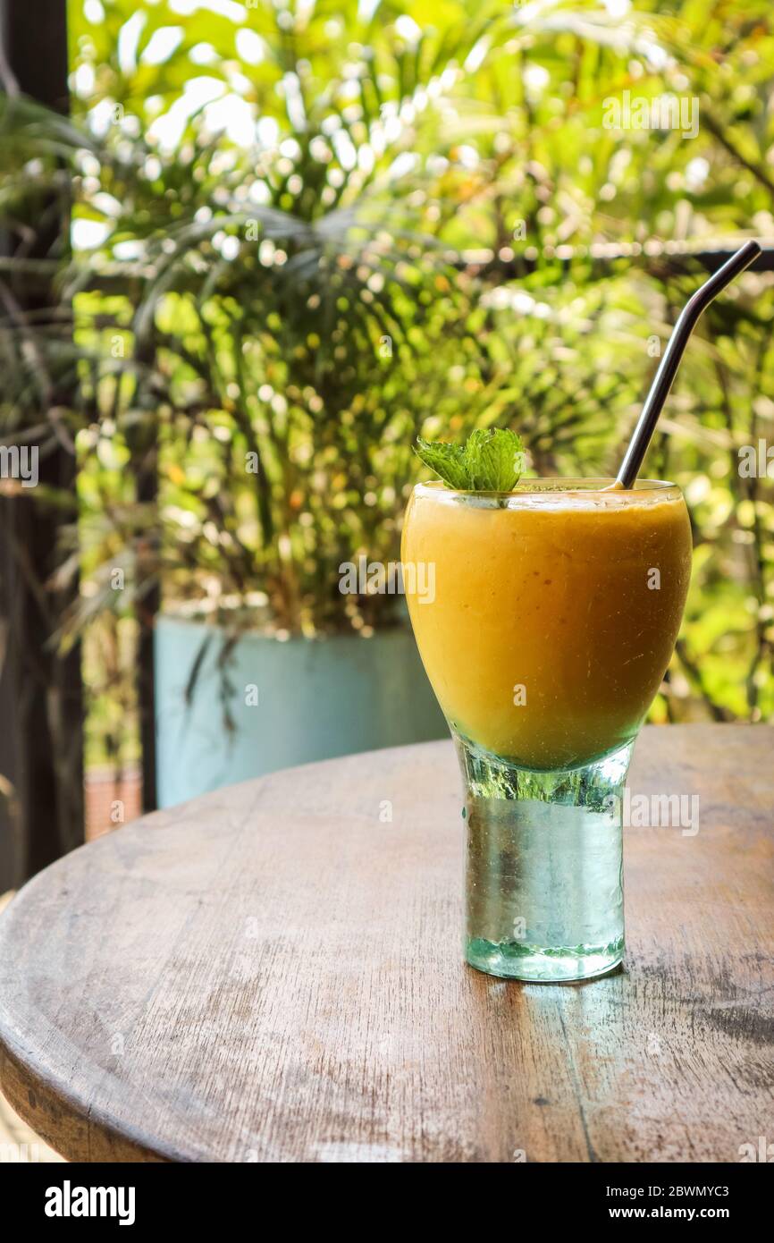 Mango juice in glass hi-res stock photography and images - Alamy