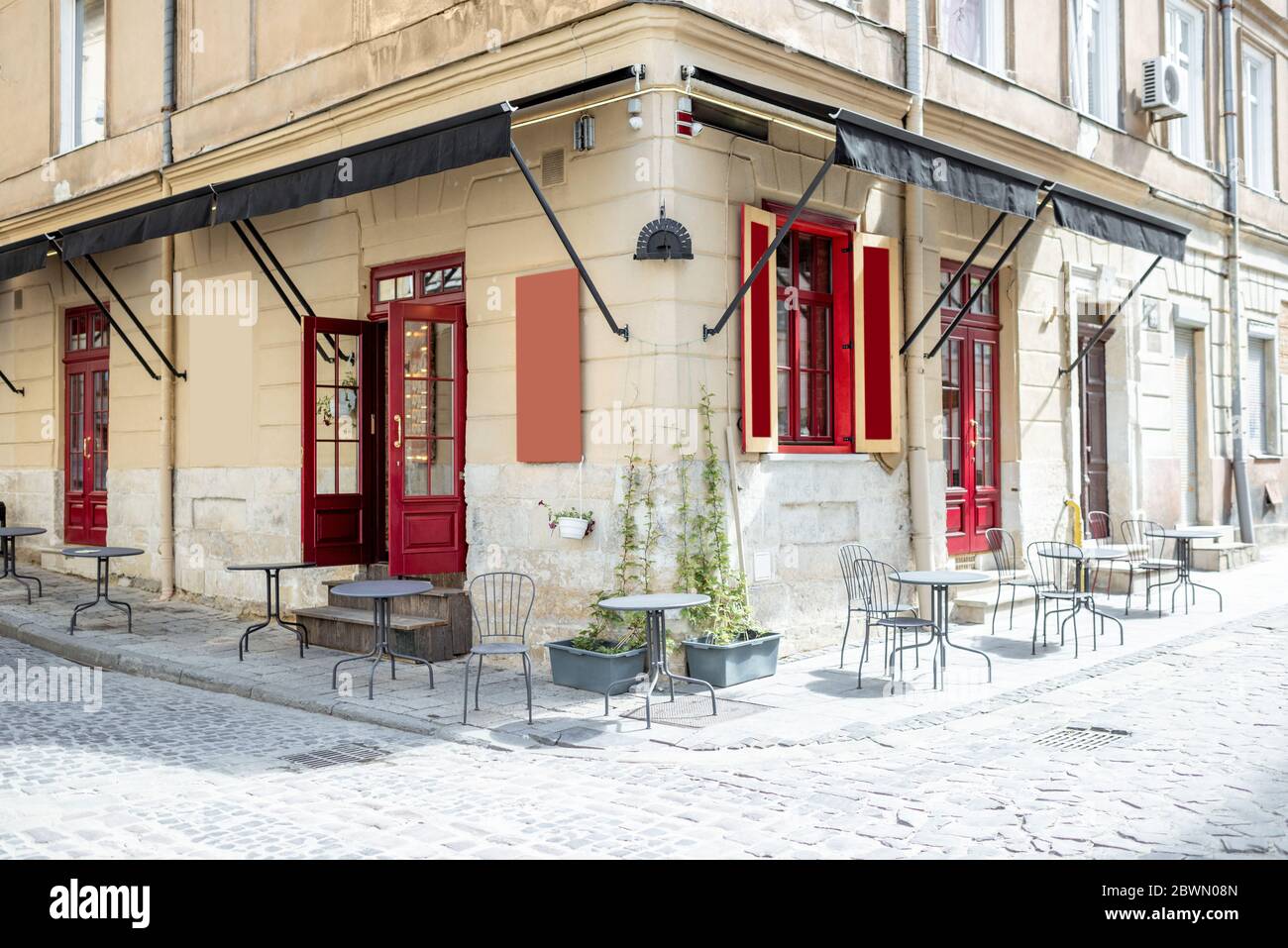 Vintage cafe corner facade on the old city street Stock Photo - Alamy