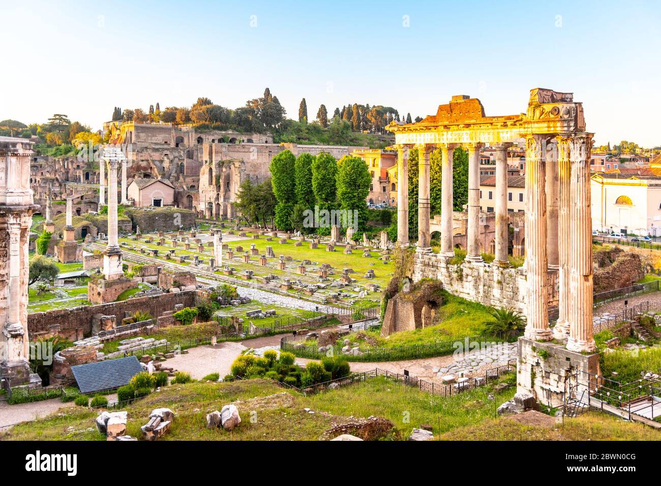 Roman Forum with ruins of Temple of Saturn on sunny summer morning ...
