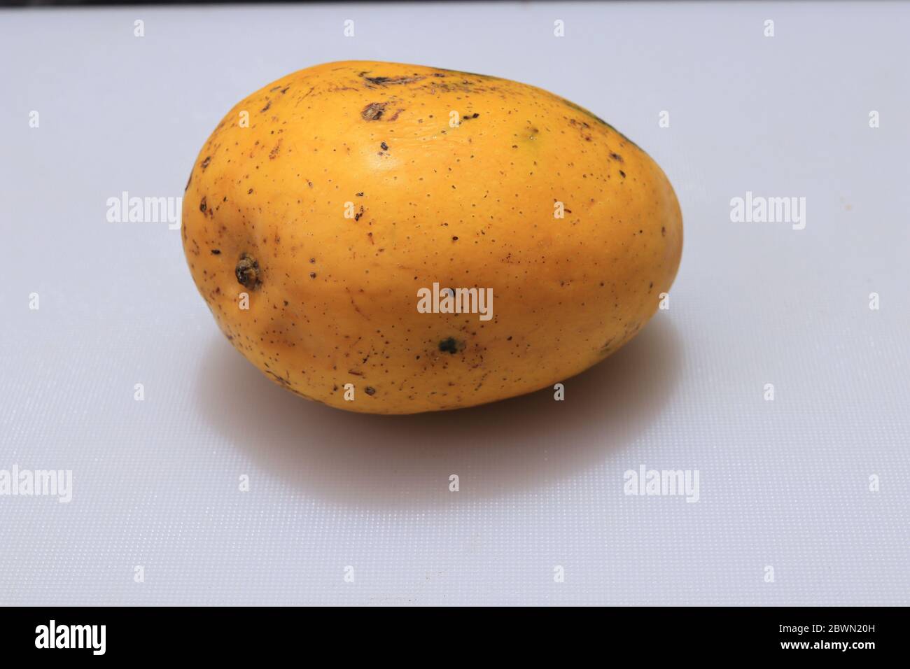 Fresh Yellow Mango fruit isolated on white background Stock Photo - Alamy