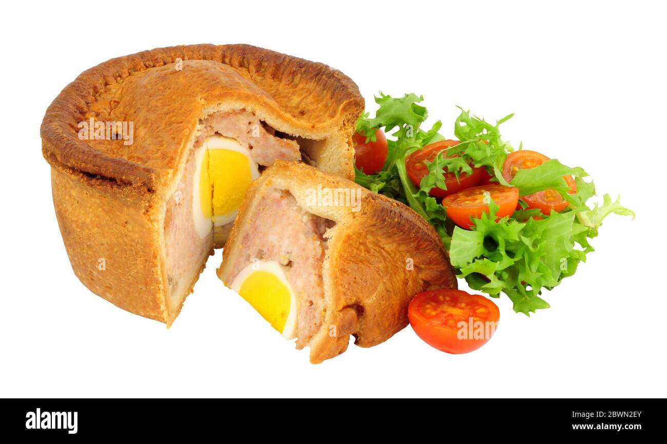 Crusty egg and pork filled savoury pie isolated on a white background ...