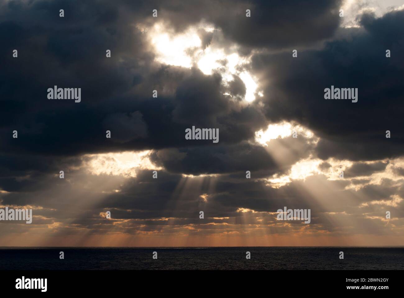 The dramatic sky with heavy clouds during the sunset near Grand Bahama ...