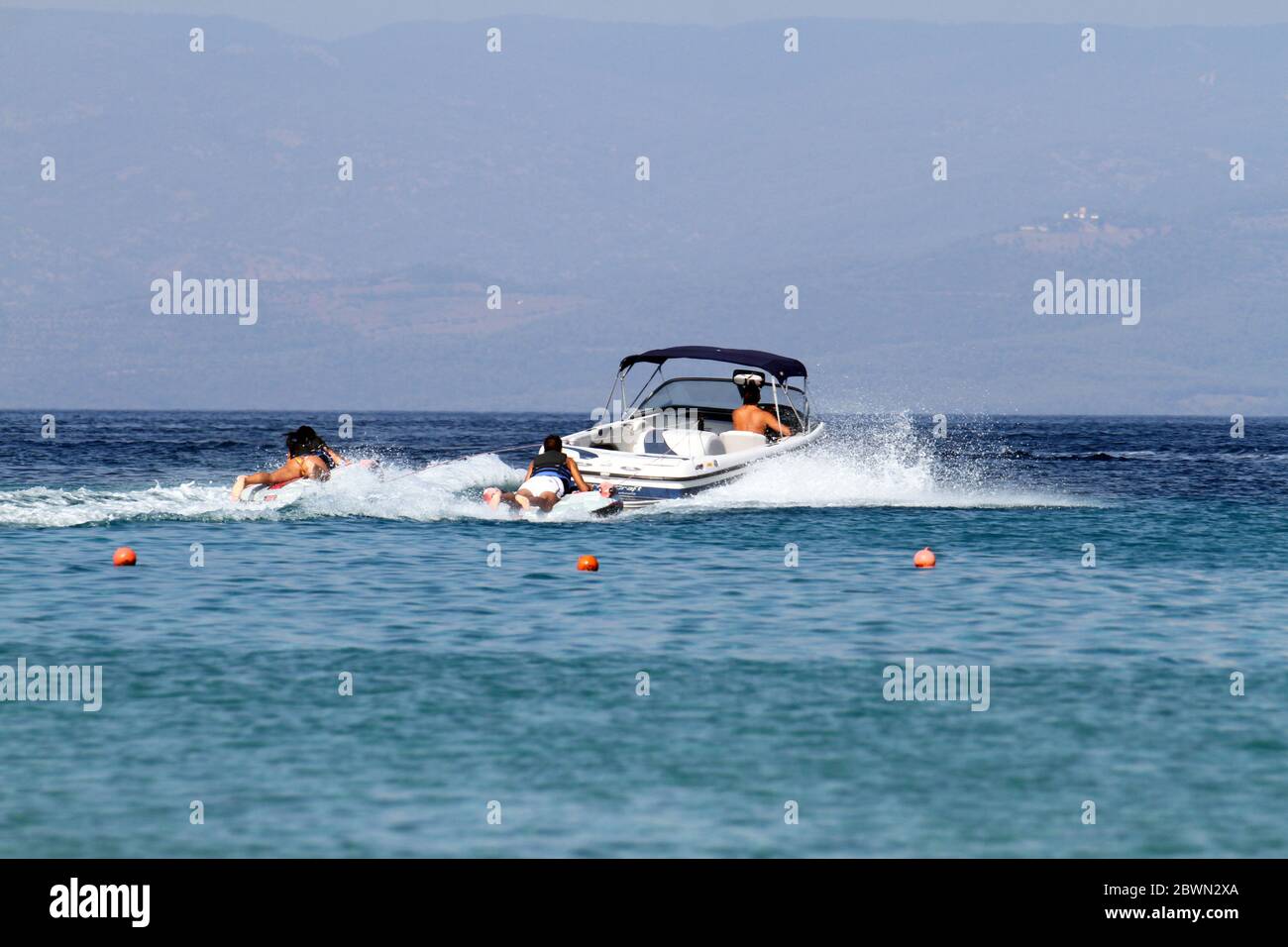 Men in a speedboat hi-res stock photography and images - Alamy