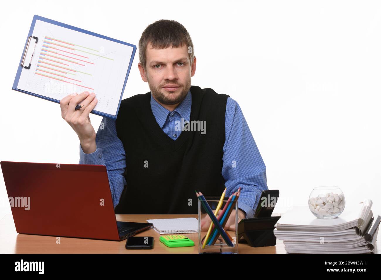 Office worker shows crossed out schedule sitting in the workplace Stock ...