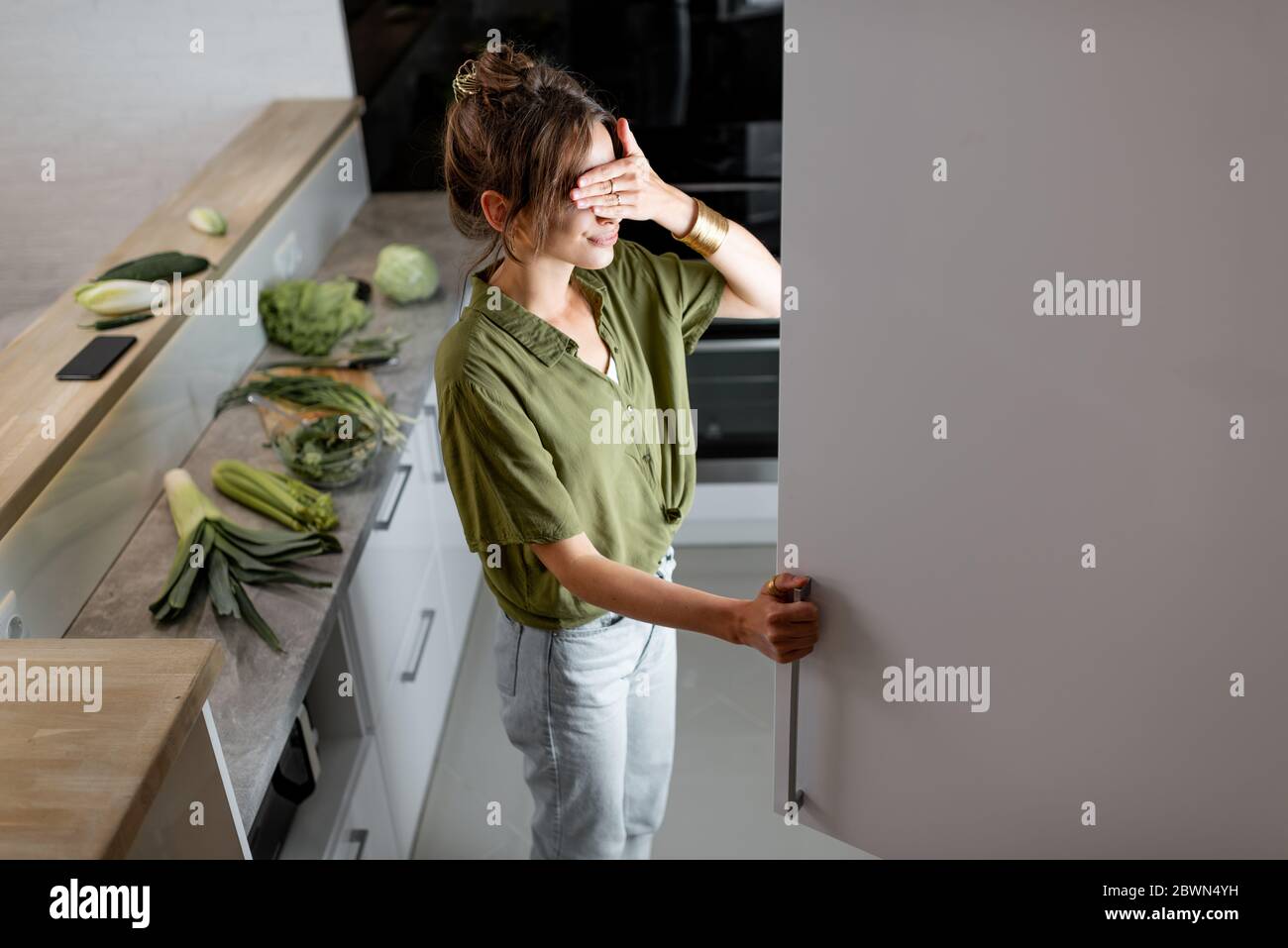 Overeating woman hi-res stock photography and images - Alamy