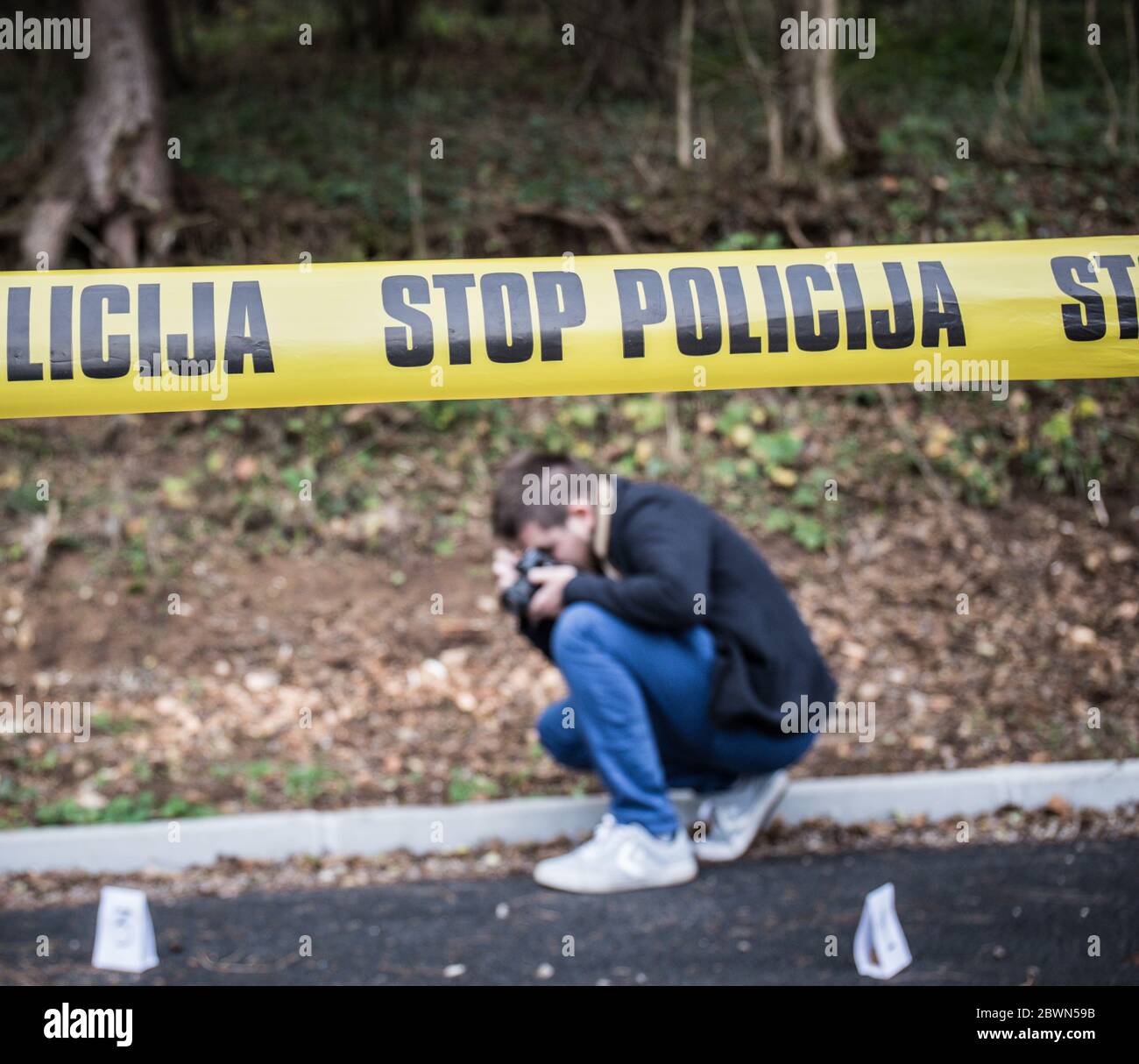 Crime scene, murder, investigation, bloody trail on asphalt, ongoing ...