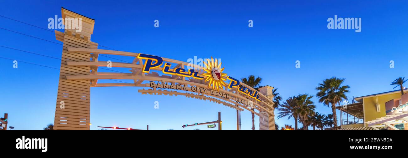 Panama City Beach Pier entrance sign at sunset, Florida Stock Photo - Alamy