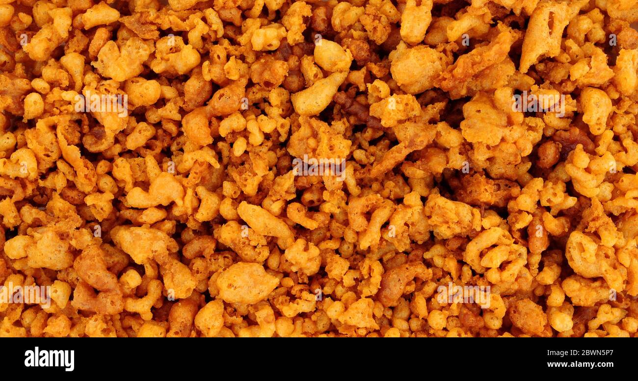 Batter scraps background texture, also known as batter bits or dubs ...