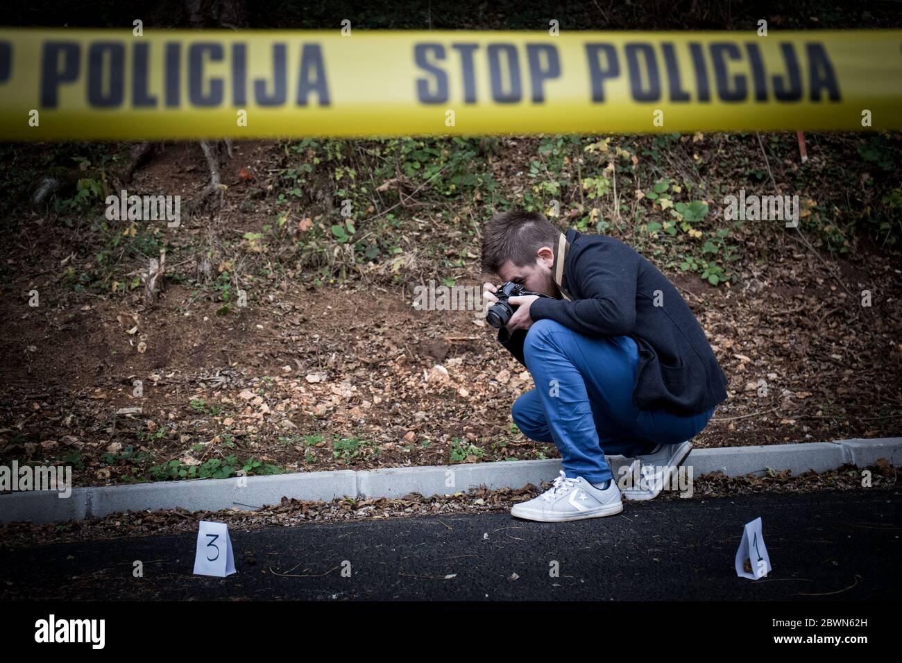 Crime scene, murder, investigation, bloody trail on asphalt, ongoing ...