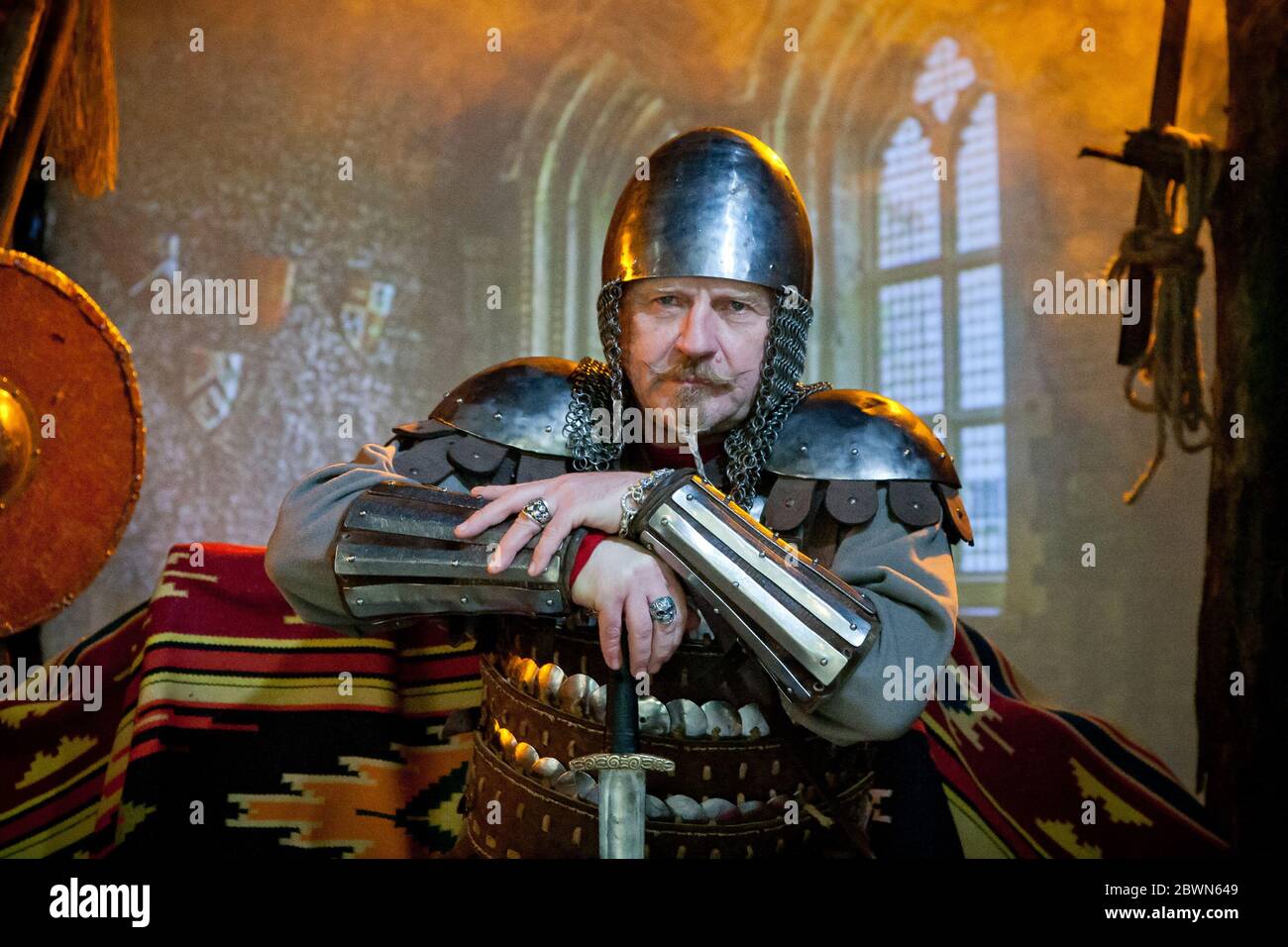 Medieval knight in iron armor Stock Photo - Alamy