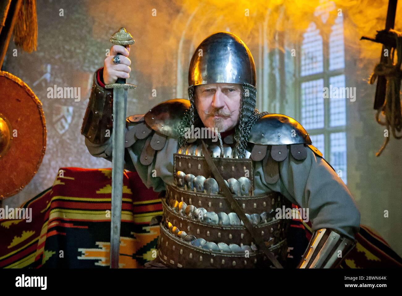 Medieval knight in iron armor Stock Photo - Alamy