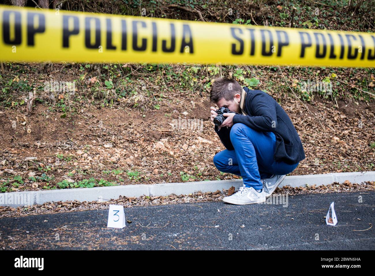 Crime scene, murder, investigation, bloody trail on asphalt, ongoing ...