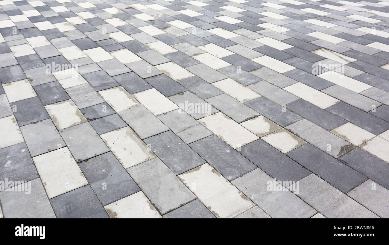Concrete paving slabs. Abstract gray paving slab texture background. Paving stones of ...