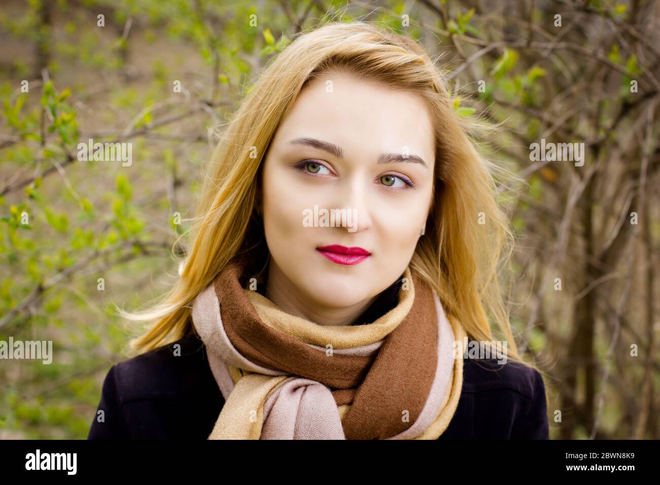beautiful woman walking in the park in spring Stock Photo - Alamy