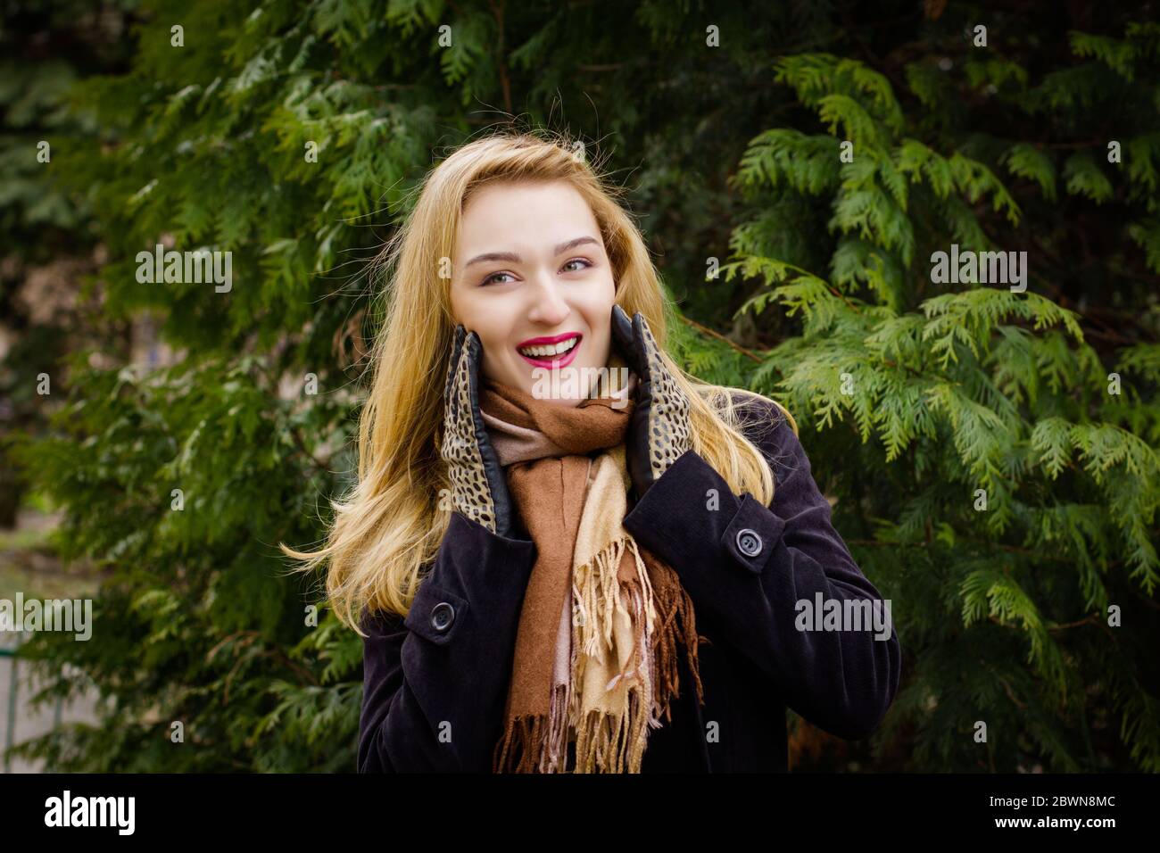 beautiful woman walking in the park in spring Stock Photo - Alamy