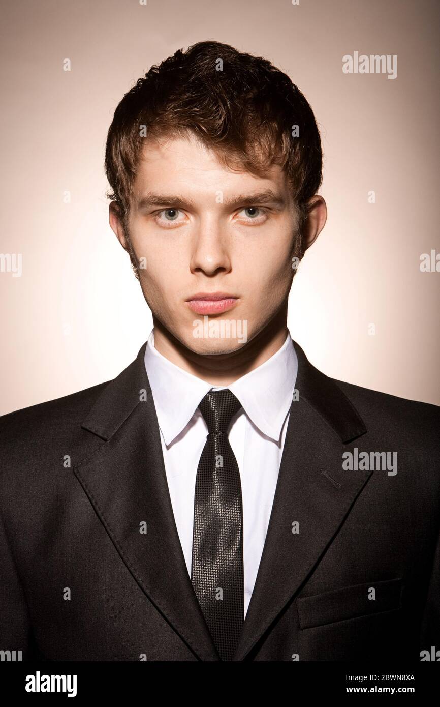 Very satisfied man in a tuxedo Stock Photo - Alamy