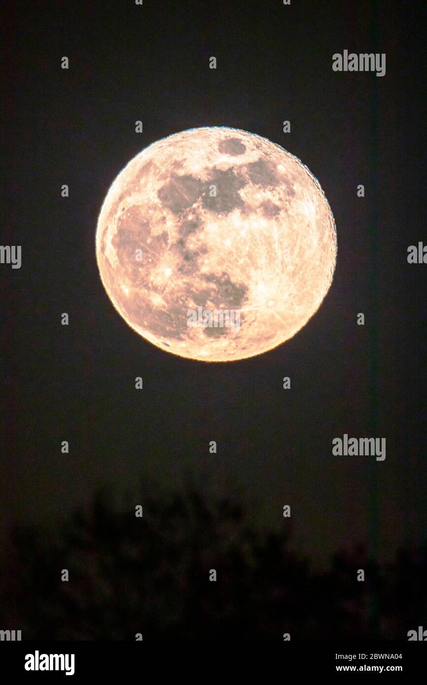 Rising moon pink sky hi-res stock photography and images - Alamy