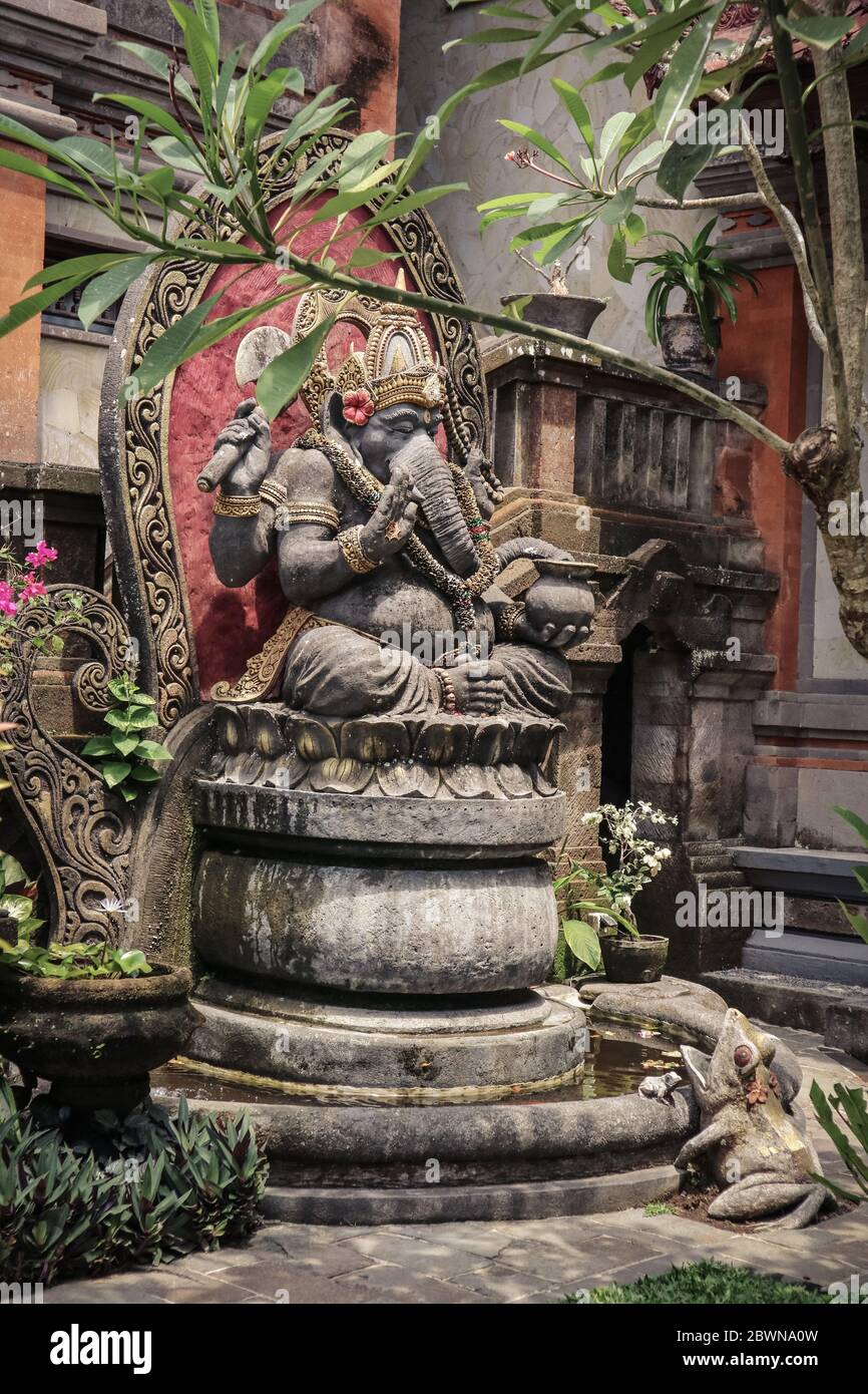 Traditional Balinese stone sculpture of Ganesh for outdoore decoration ...