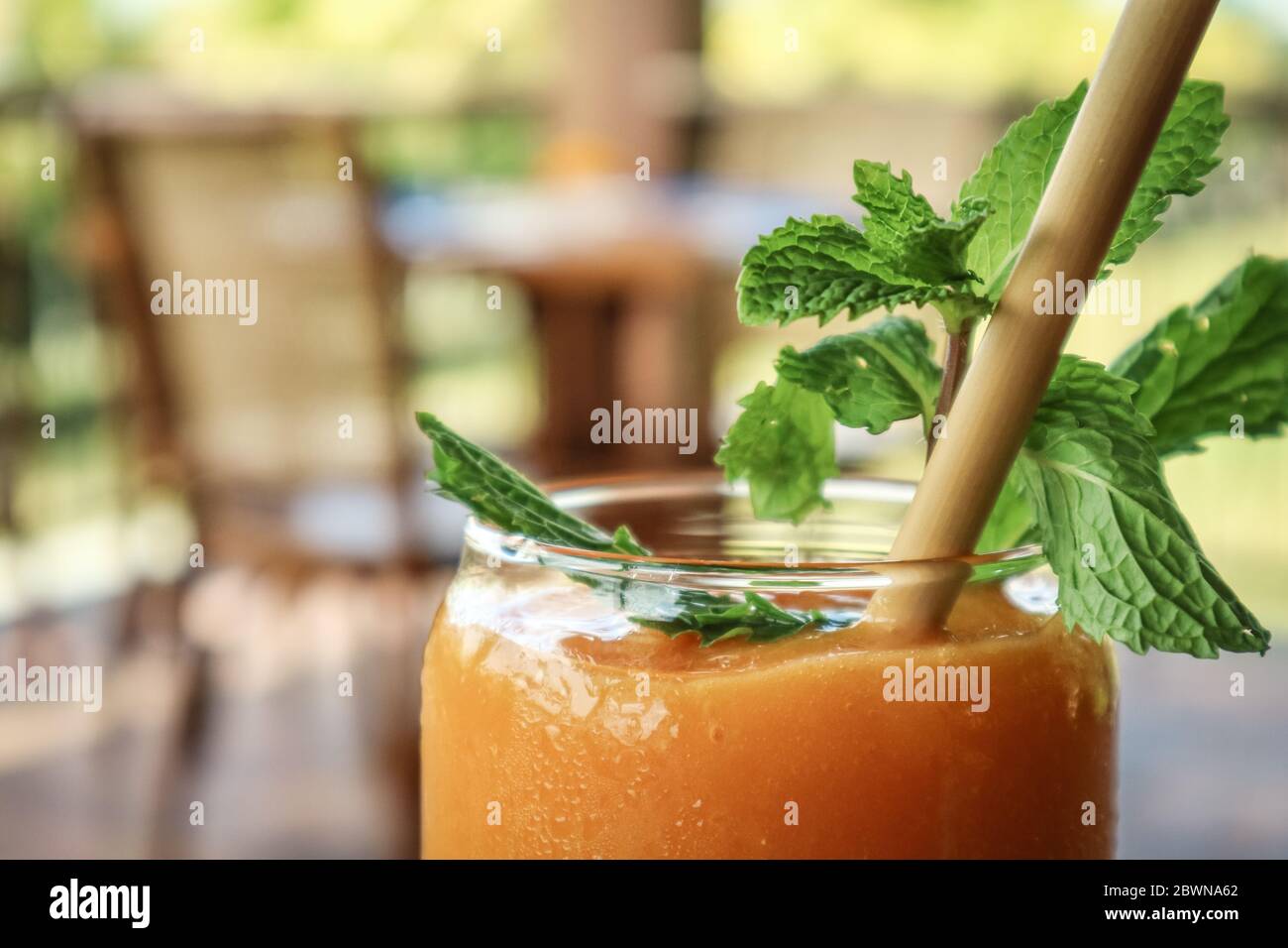 Glass mango smoothie bamboo hi-res stock photography and images - Alamy
