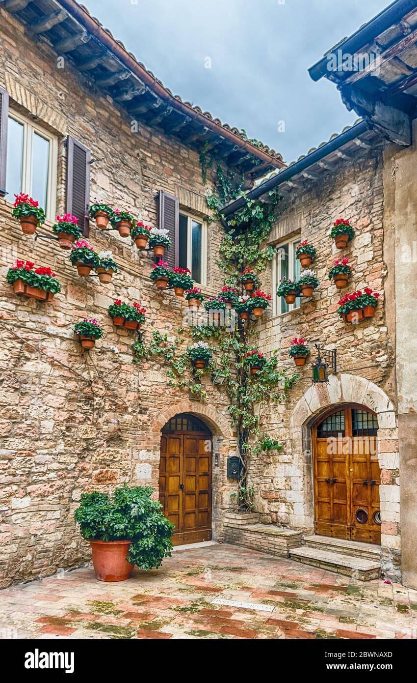Historical buildings in the old city center of Assisi, one of the most ...