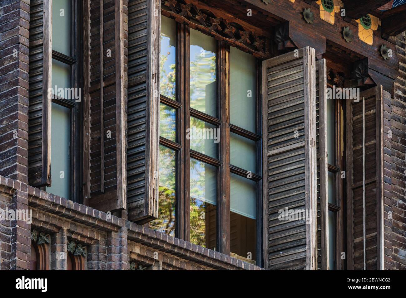 Detail of the upper windows with wooden shutters of Golferichs House in ...