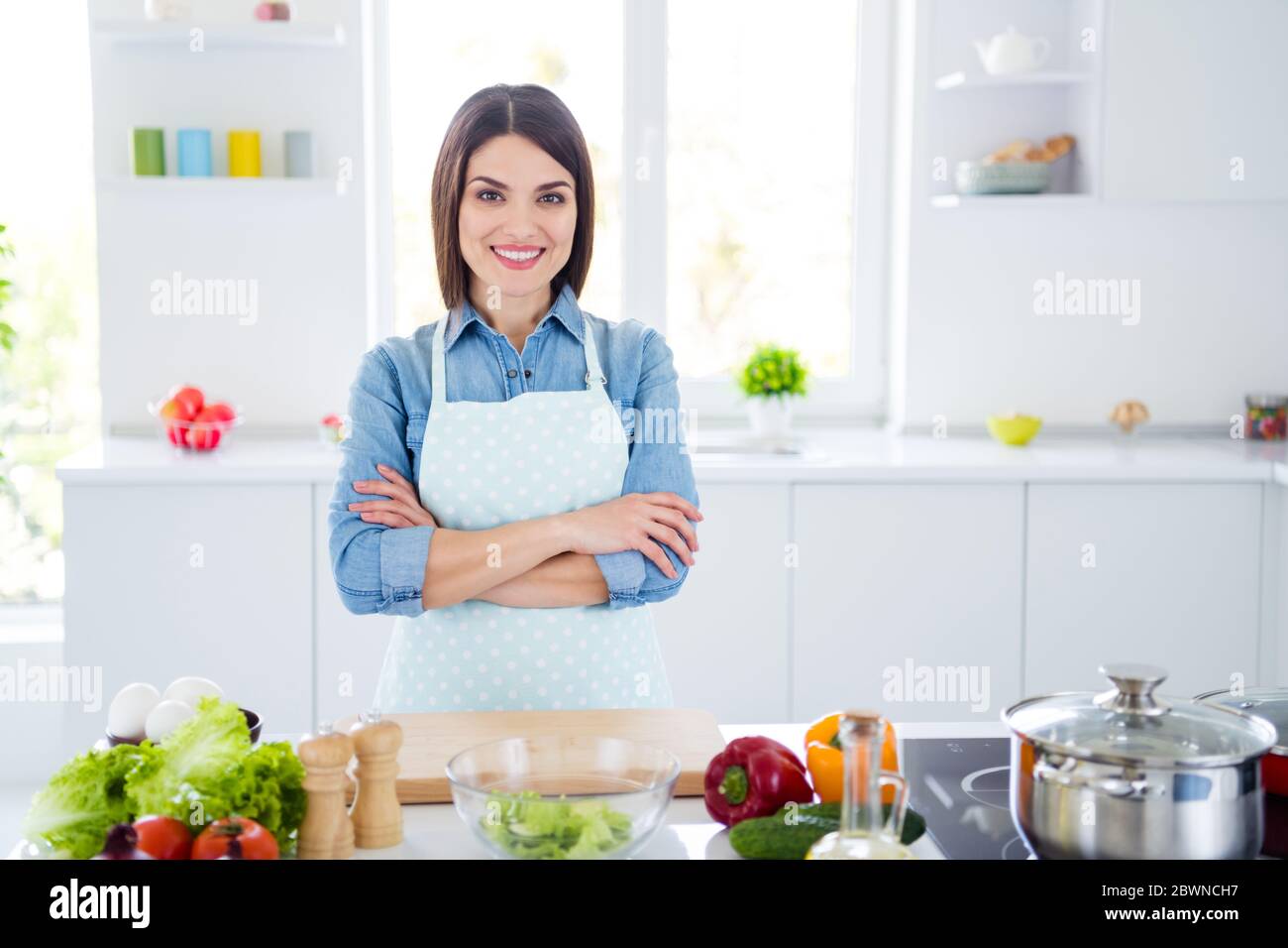 Portrait of her she nice attractive lovely cheerful housewife cooking ...