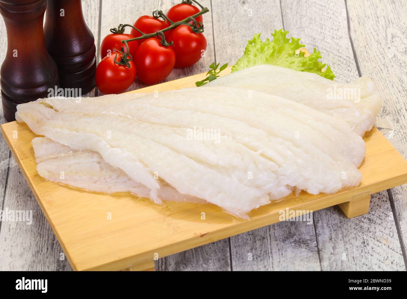 Raw halibut fillet ready for cooking Stock Photo - Alamy