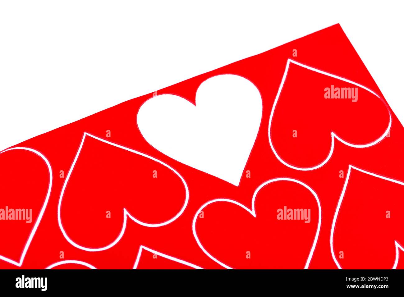 One red missing stolen heart among many symbols in a row, empty space ...