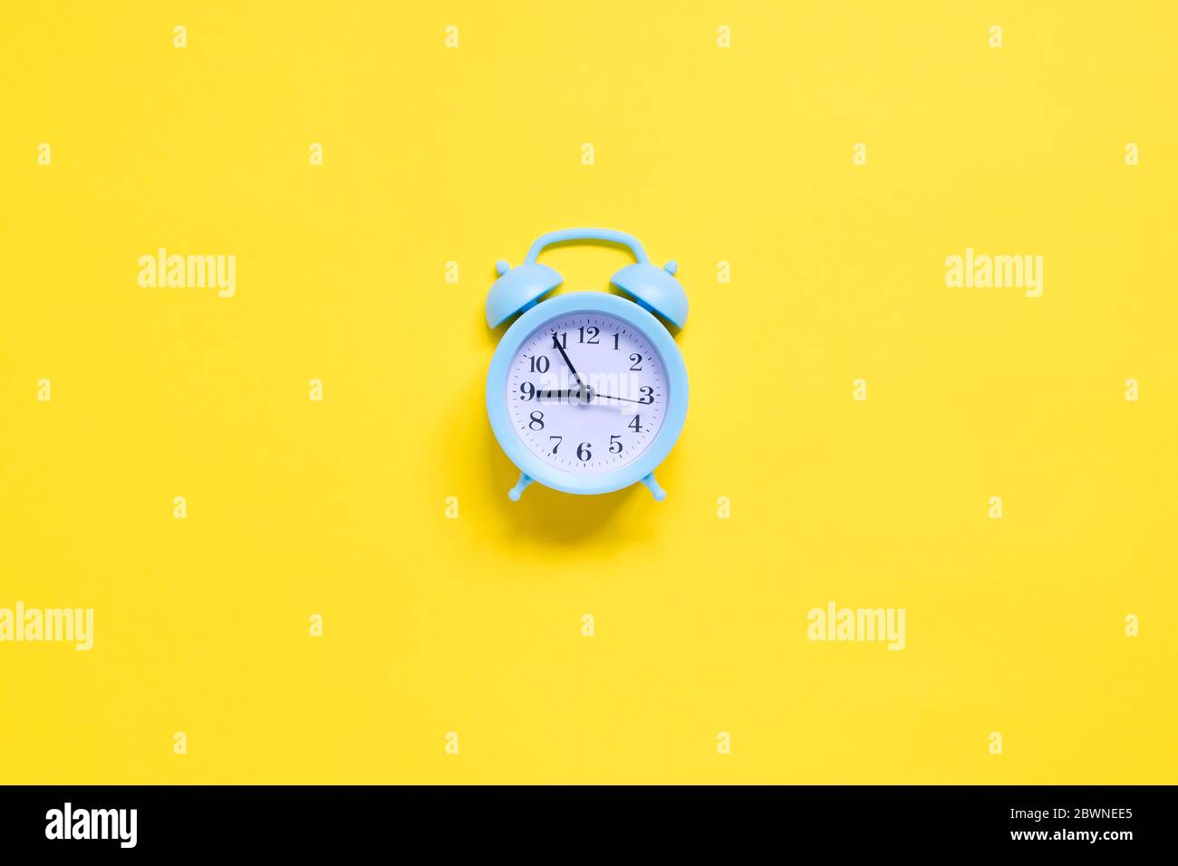 Old alarm clock yellow hi-res stock photography and images - Alamy
