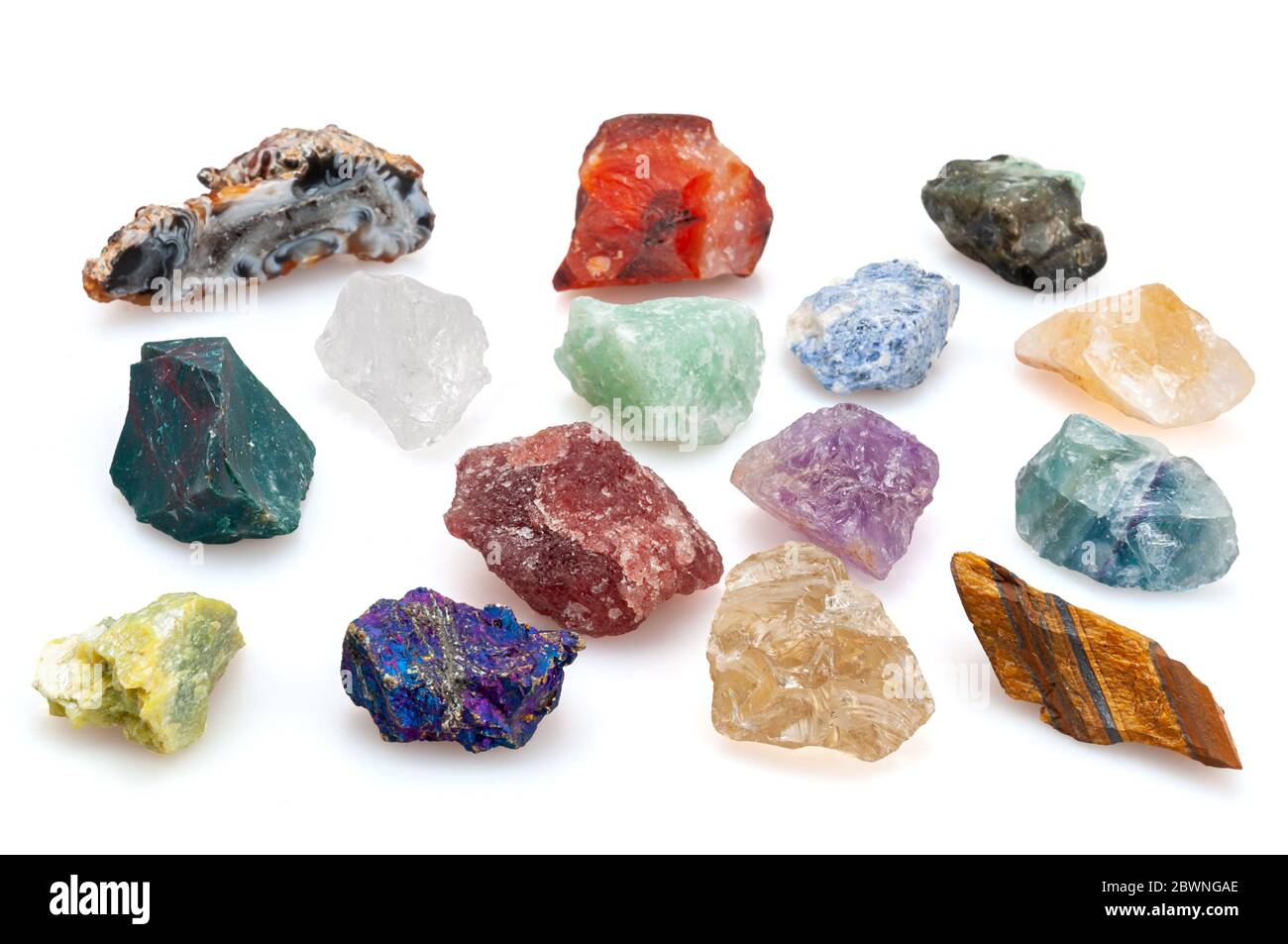 Different stones minerals on a white background Stock Photo - Alamy