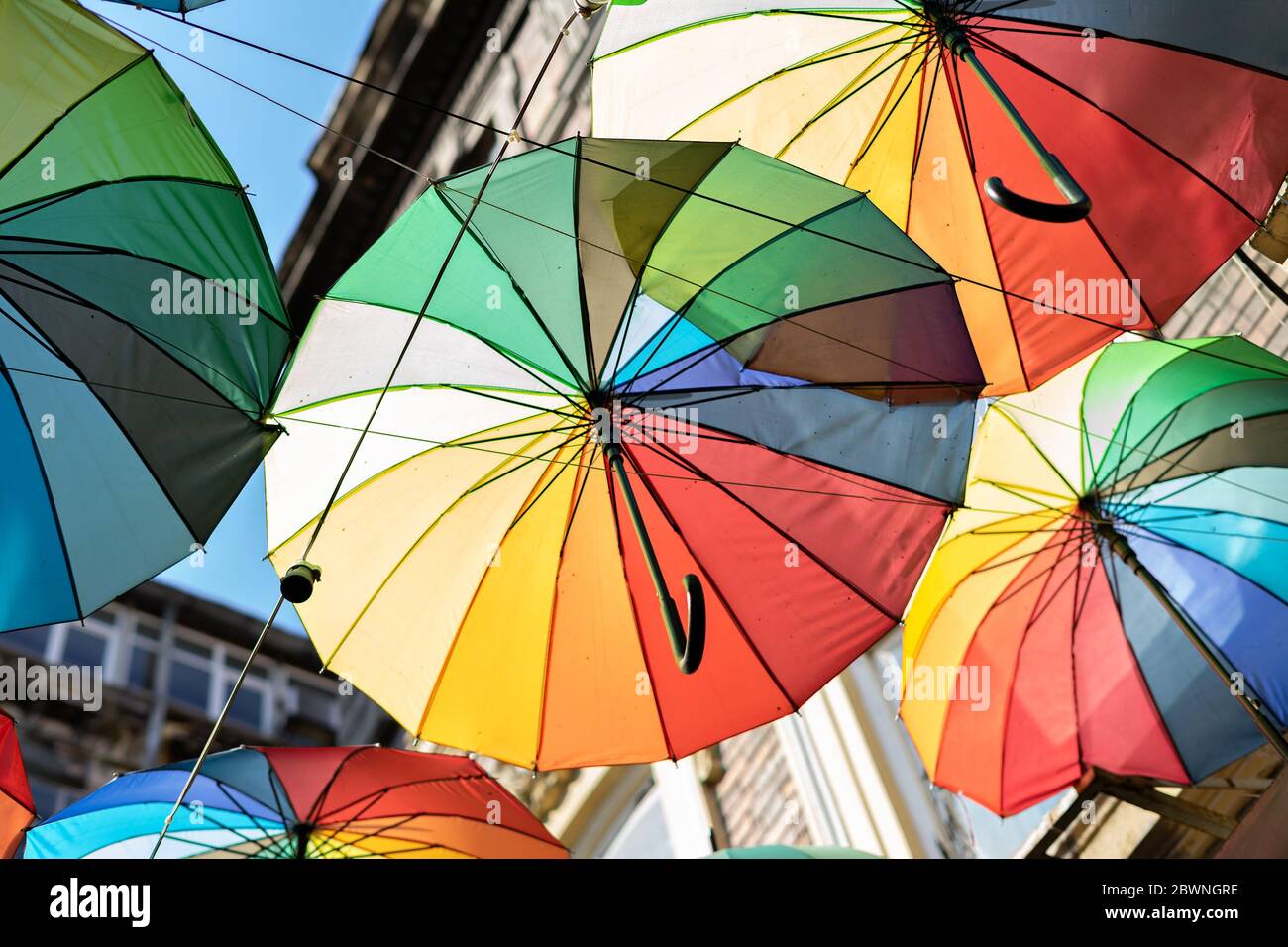Background colorful rainbow different color umbrellas. unban tourist ...