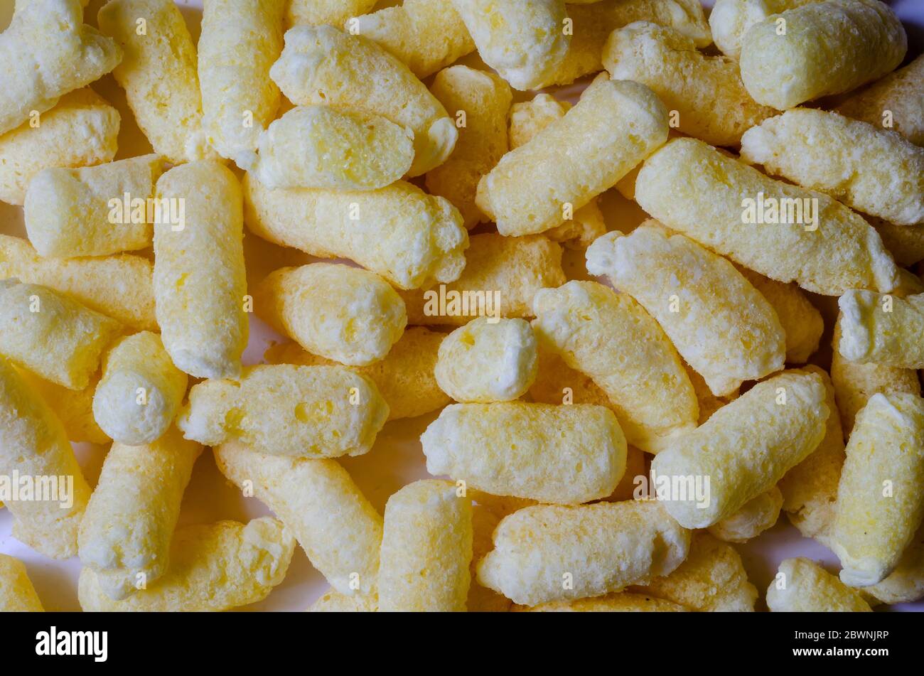 Airy Crisps, Corn Puffs, Puffcorn Snacks Background. Detailed shot of ...