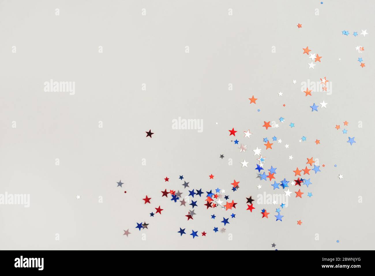 Festive background with confetti in the color of the American flag ...