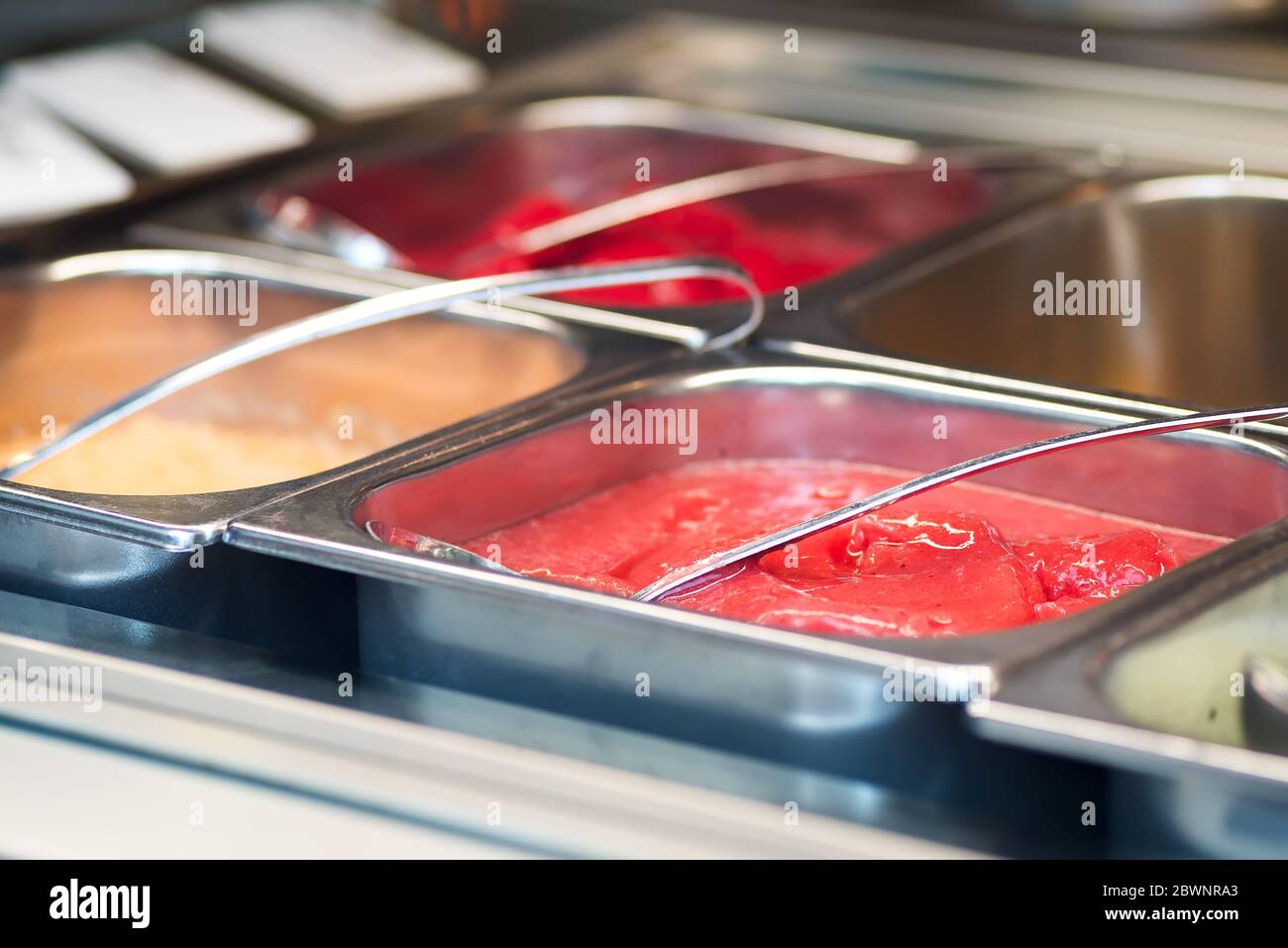 Detail of the inside window of an ice-cream maker showing the trays ...
