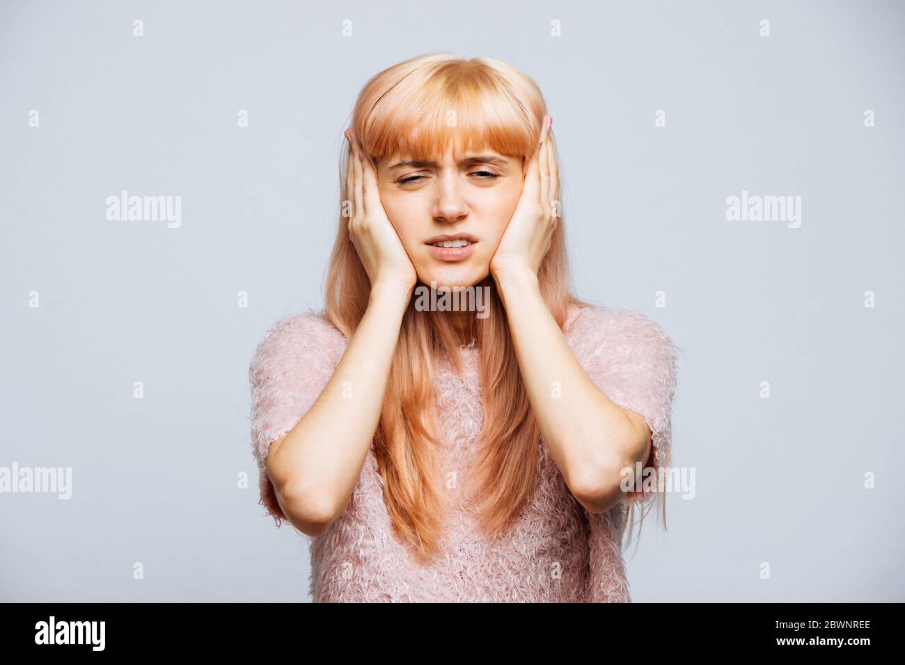 Close up of ear pain hi-res stock photography and images - Alamy