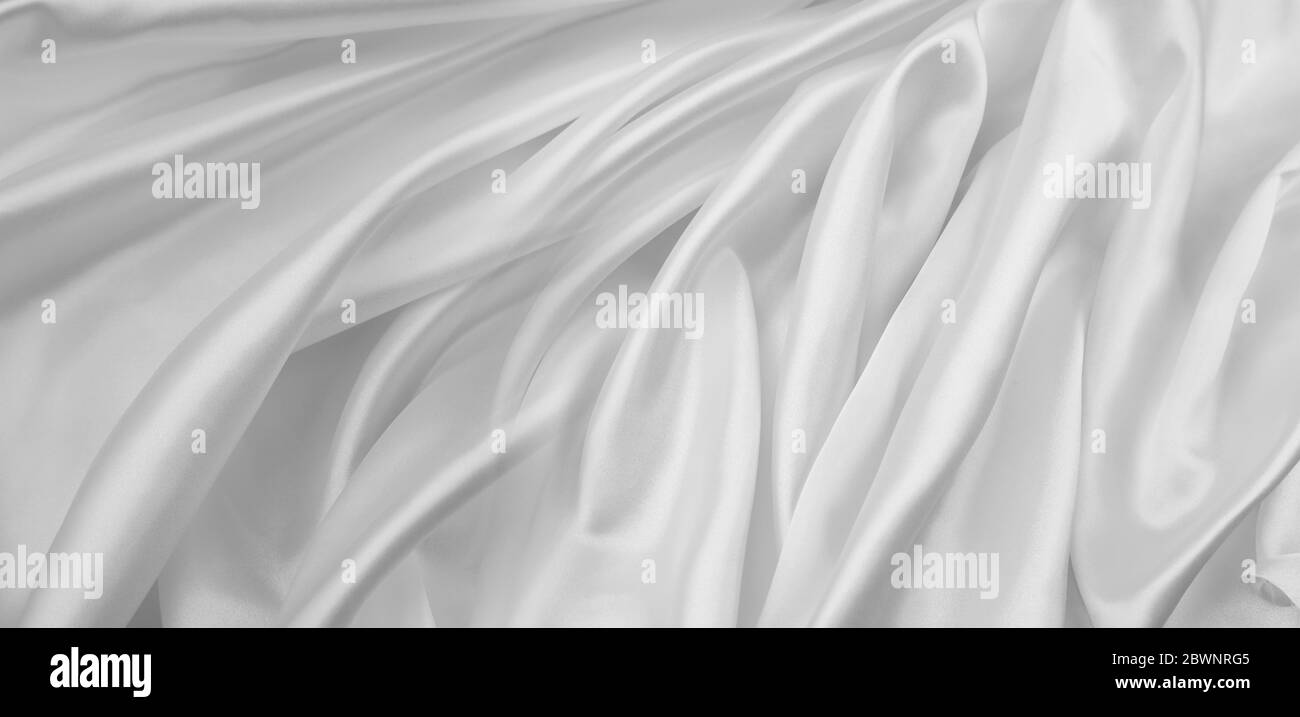 Closeup of rippled white silk fabric lines Stock Photo - Alamy
