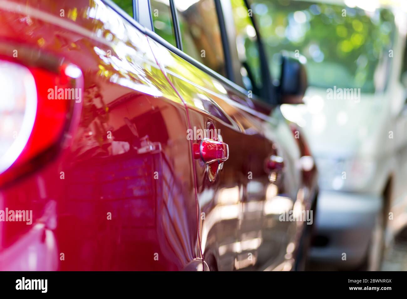 Car turning into side street hi-res stock photography and images - Alamy