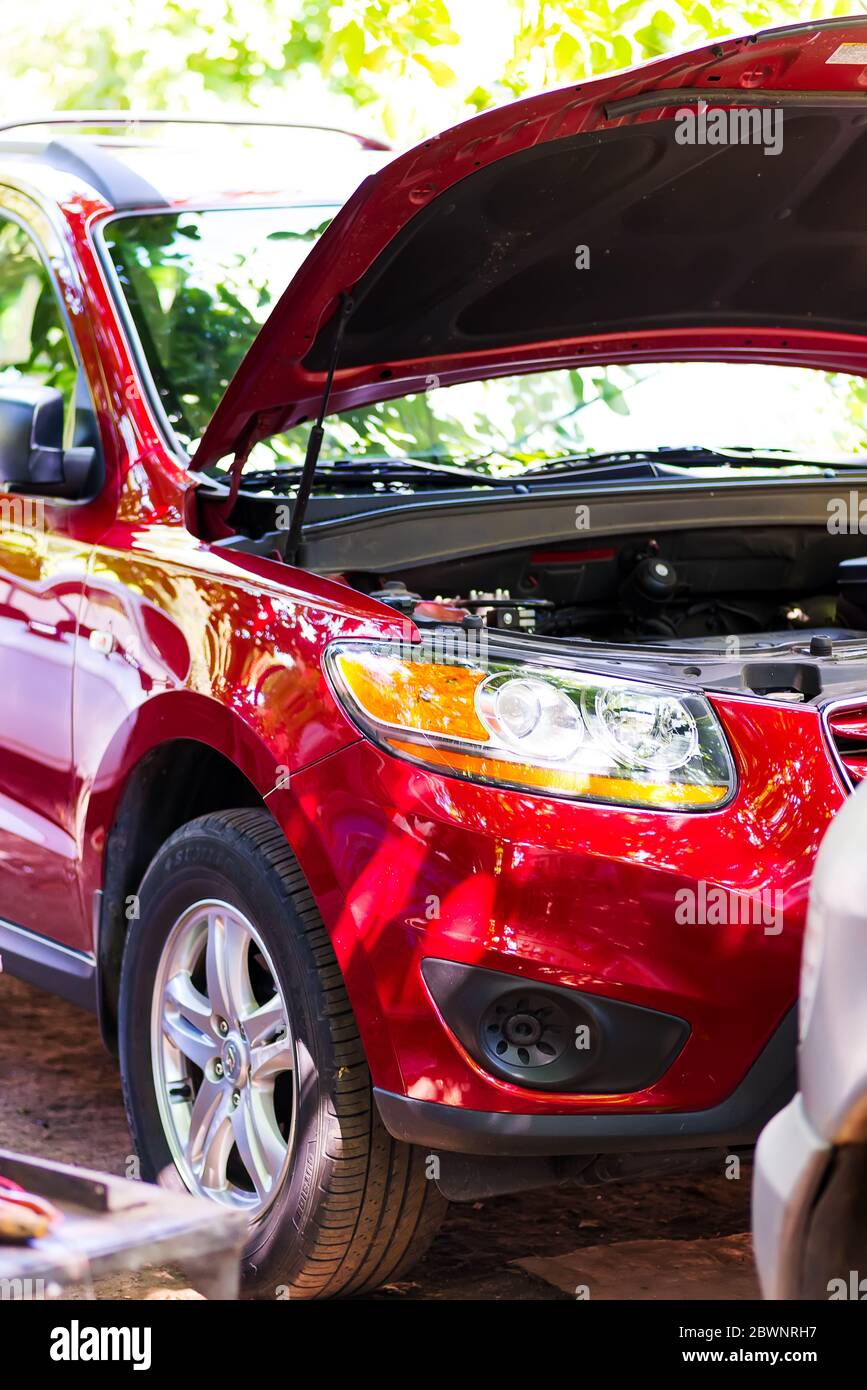 Ukraine, Kyiv - August, 2019 : Hyundai red car in the repair with an ...