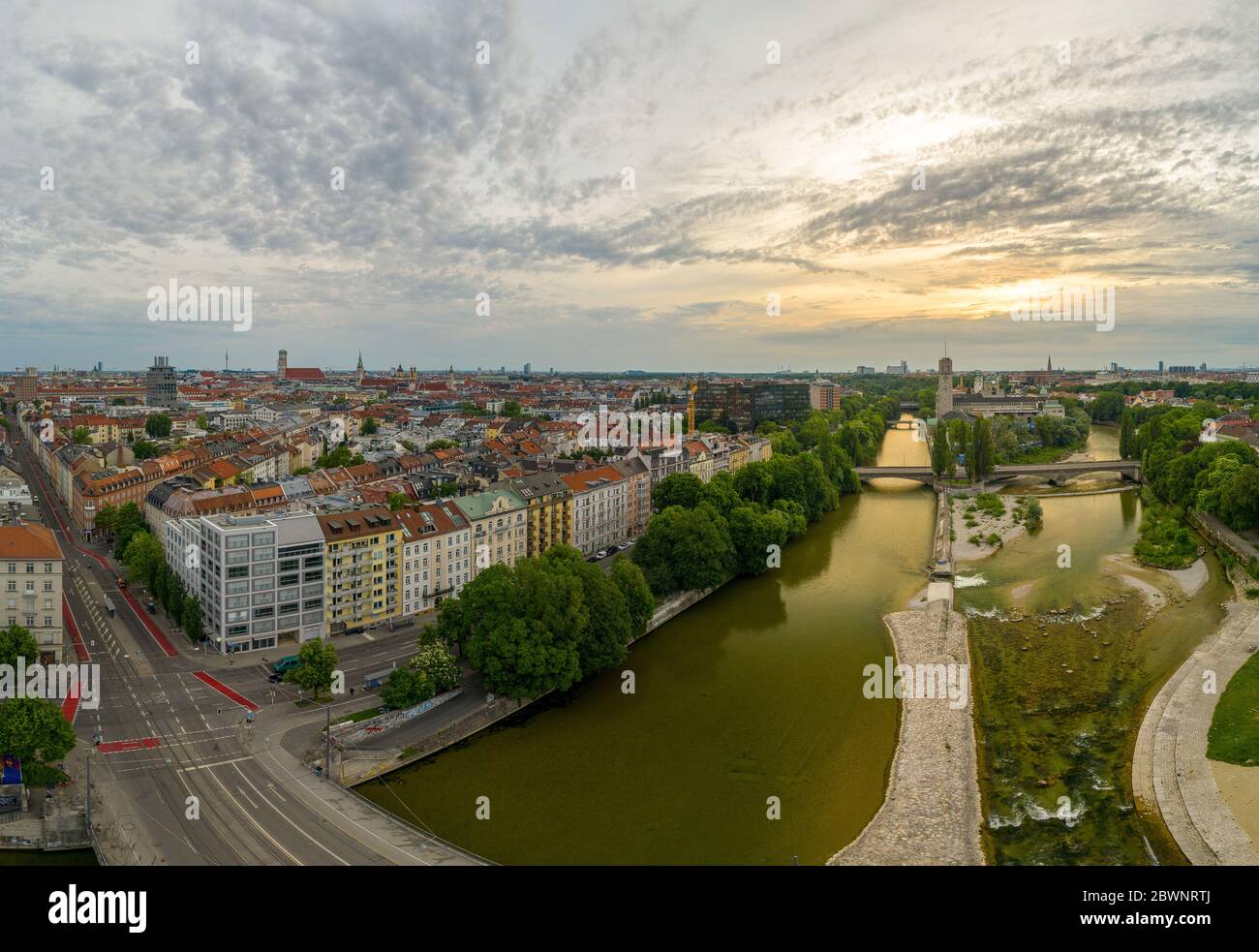 Munich view from a drone at the sunrise includes the Isar river and ...