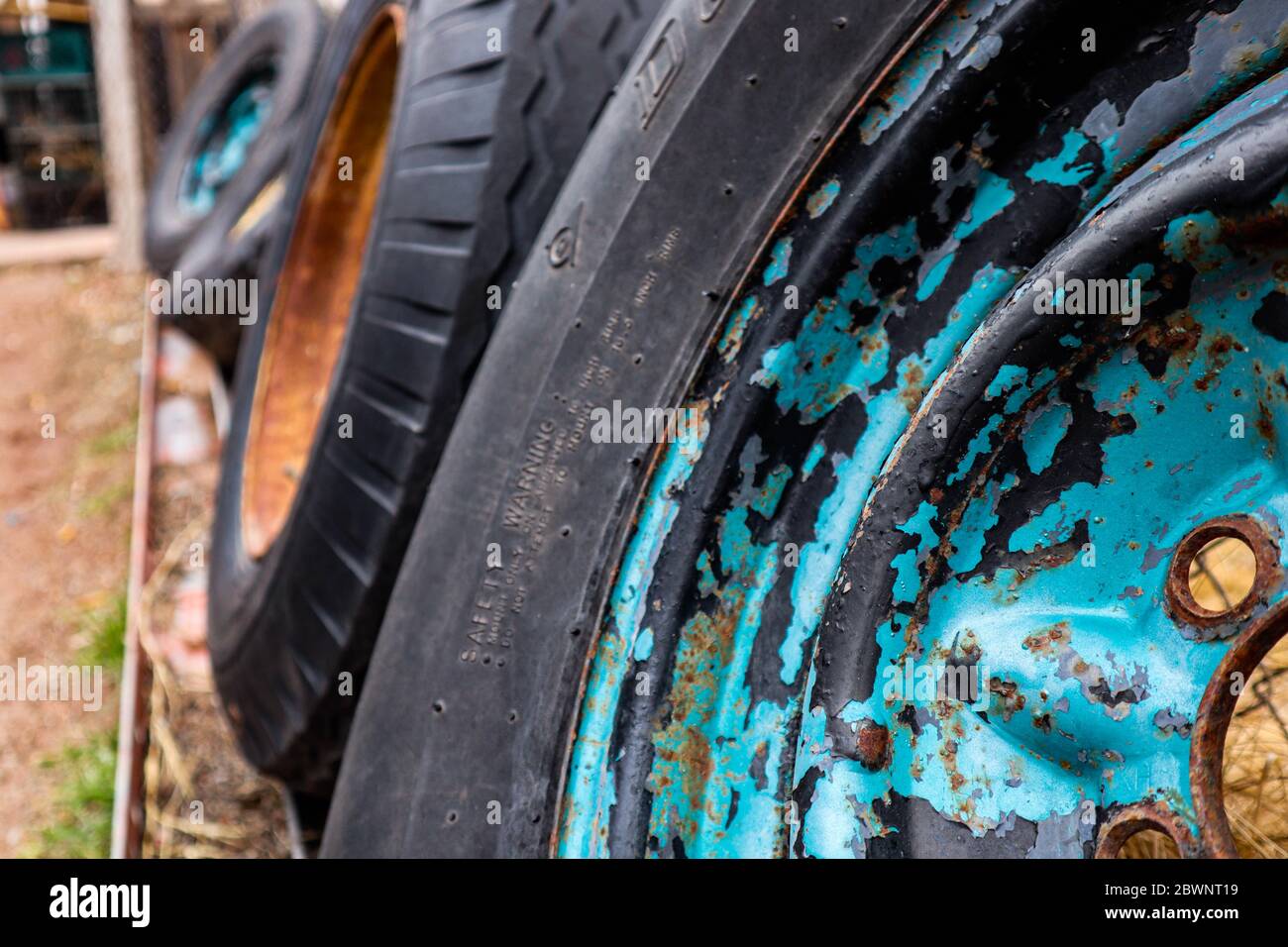 Old Blue Rusty Rims on faded Tires Stock Photo - Alamy