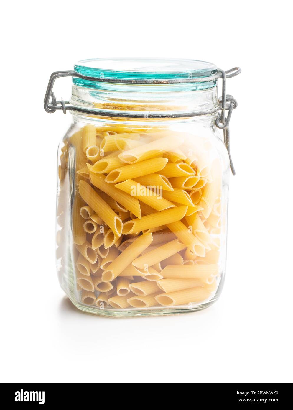 Uncooked penne pasta. Dried italian pasta in jar isolated on white ...